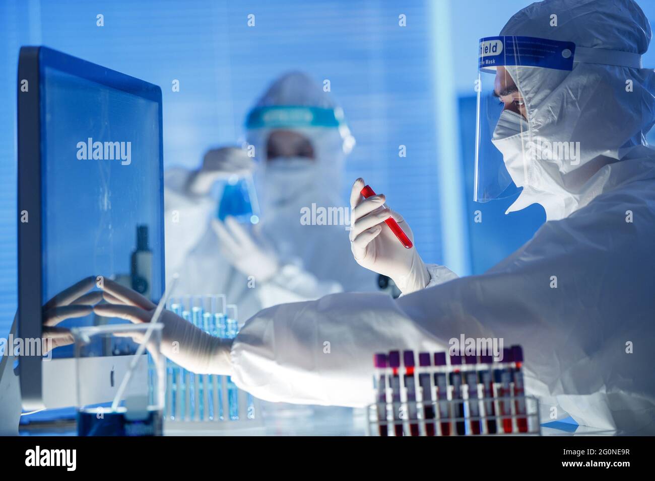 Medical workers do medical experiments Stock Photo - Alamy