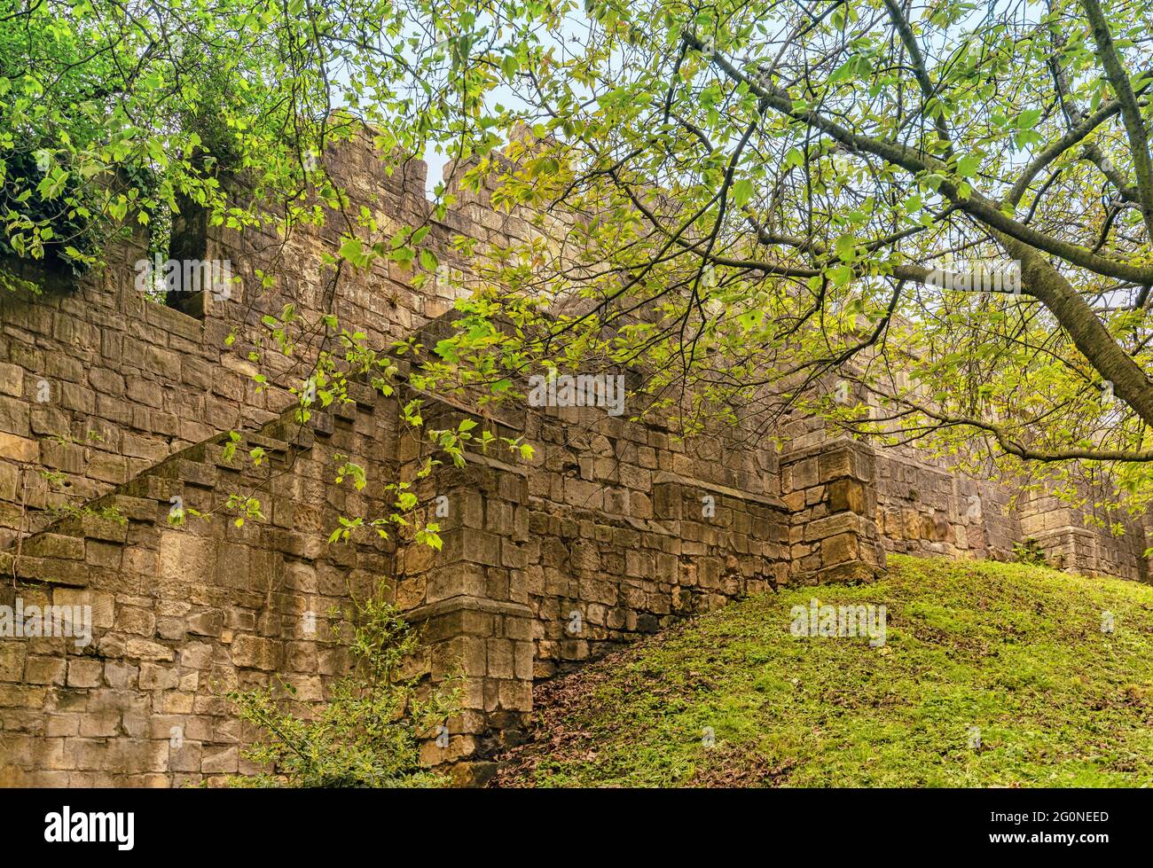 A section of the famous York city walls. The wall stands on a sloping ...