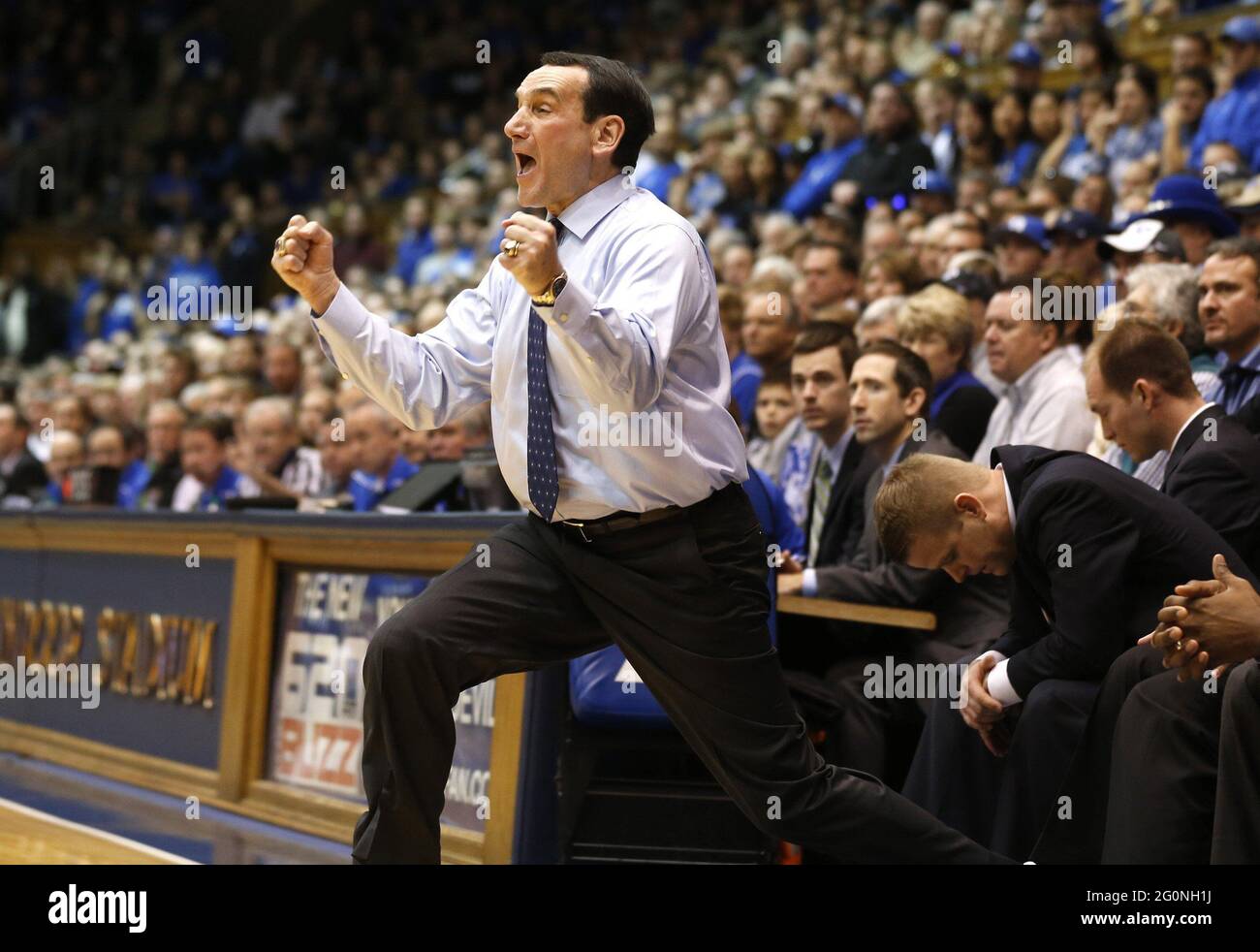 Duke head coach Mike Krzyzewski yells at his players during the first ...