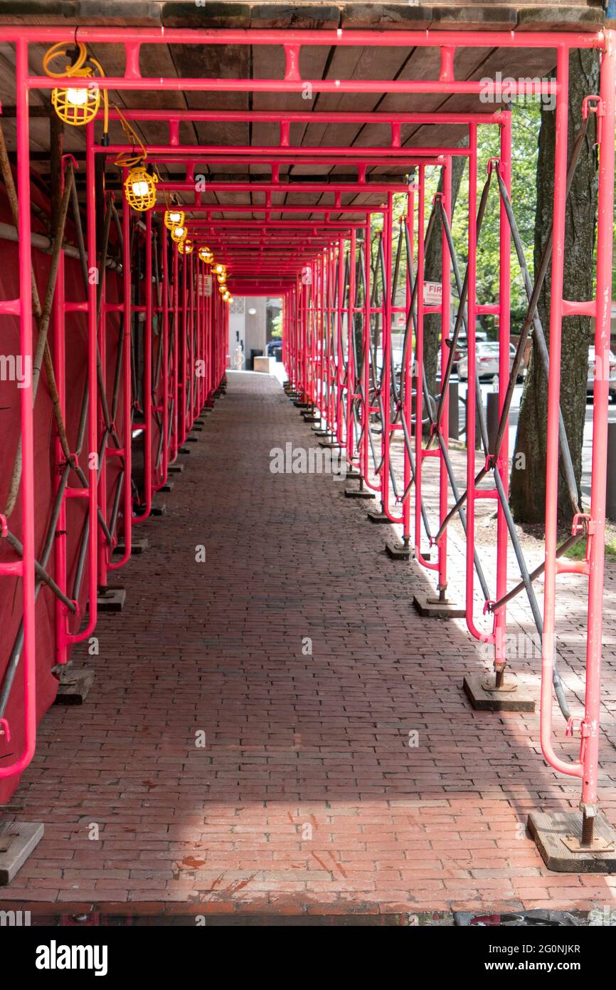 Pink scaffolding cover hi-res stock photography and images - Alamy