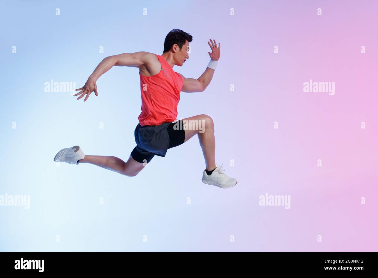 Running jump athletes Stock Photo - Alamy