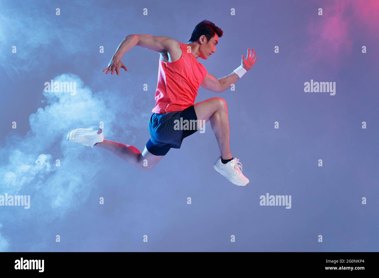 Running jump athletes Stock Photo - Alamy