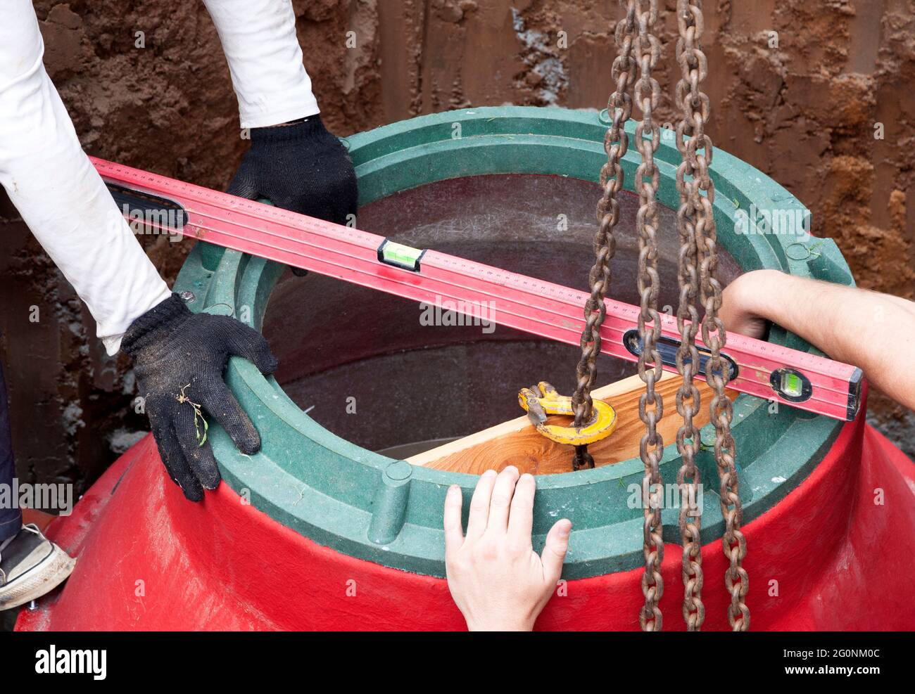 Installation of underground tank for sewage system Stock Photo - Alamy