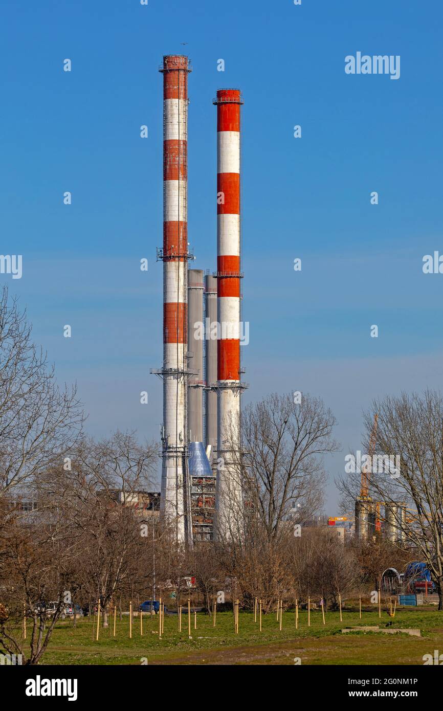 Tall Red and White Chimneys at Industrial Plant Stock Photo - Alamy