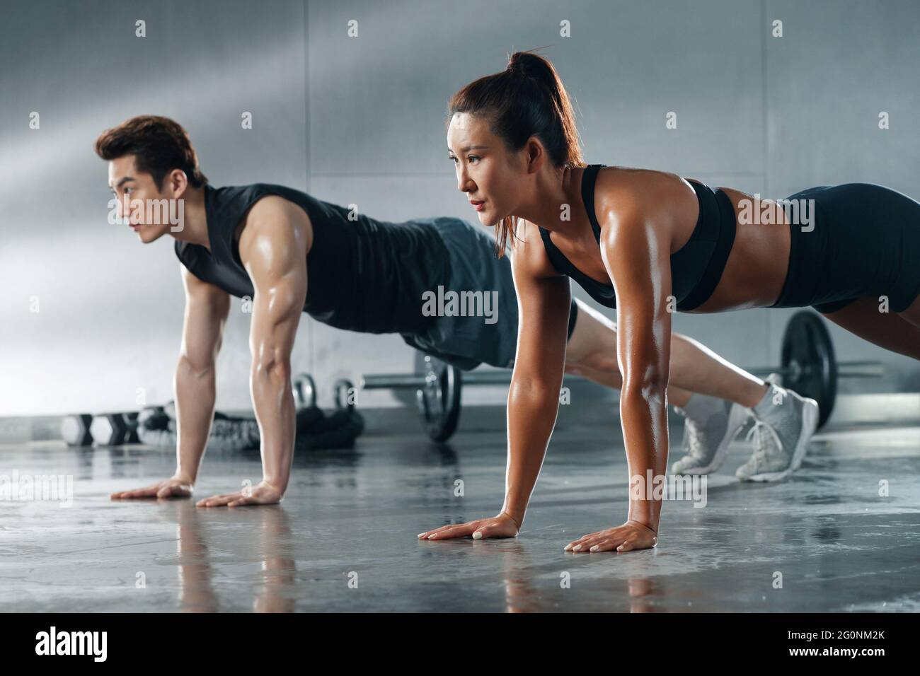 Young people in the gym to work out Stock Photo - Alamy