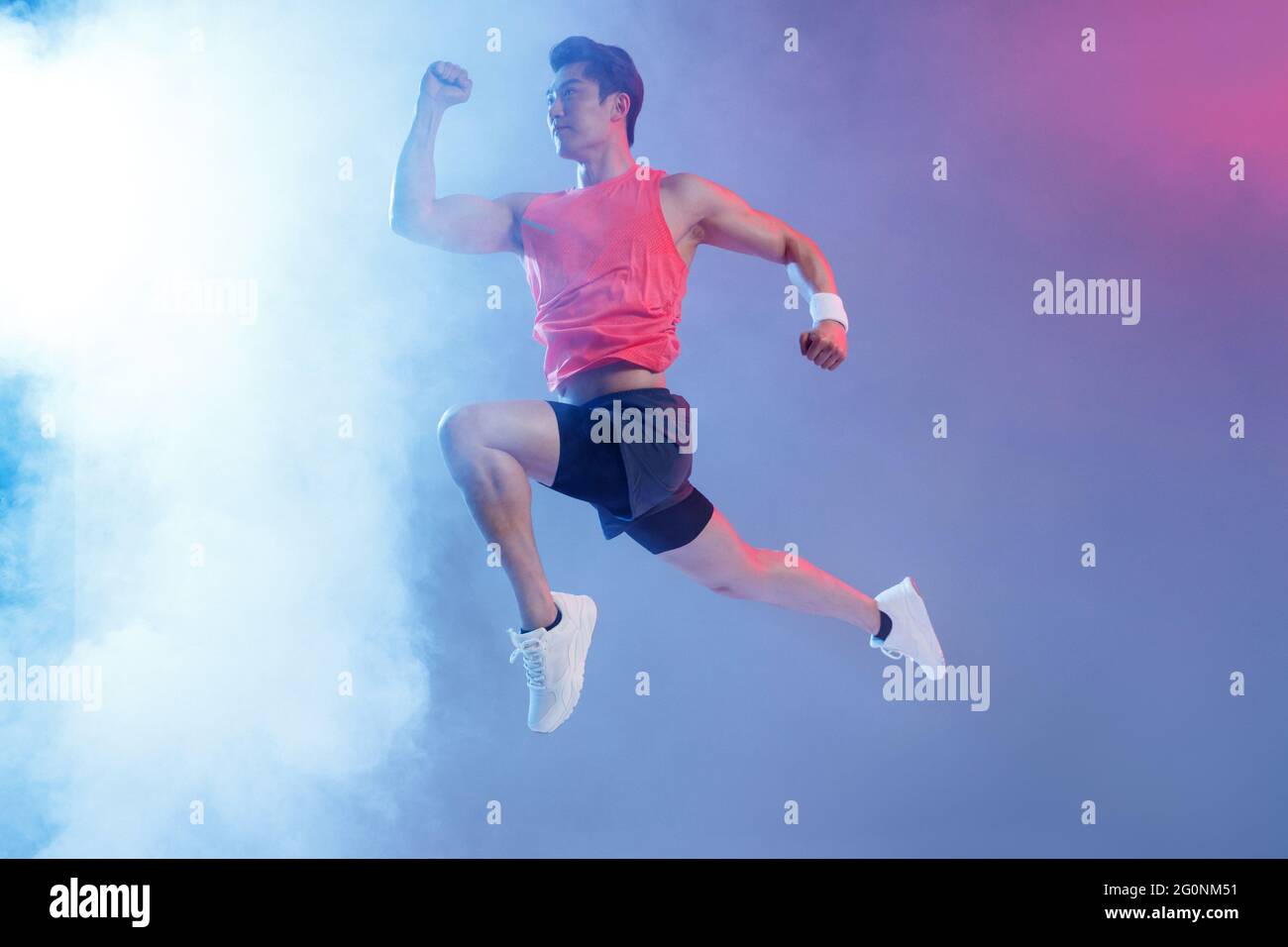 Running jump athletes Stock Photo - Alamy