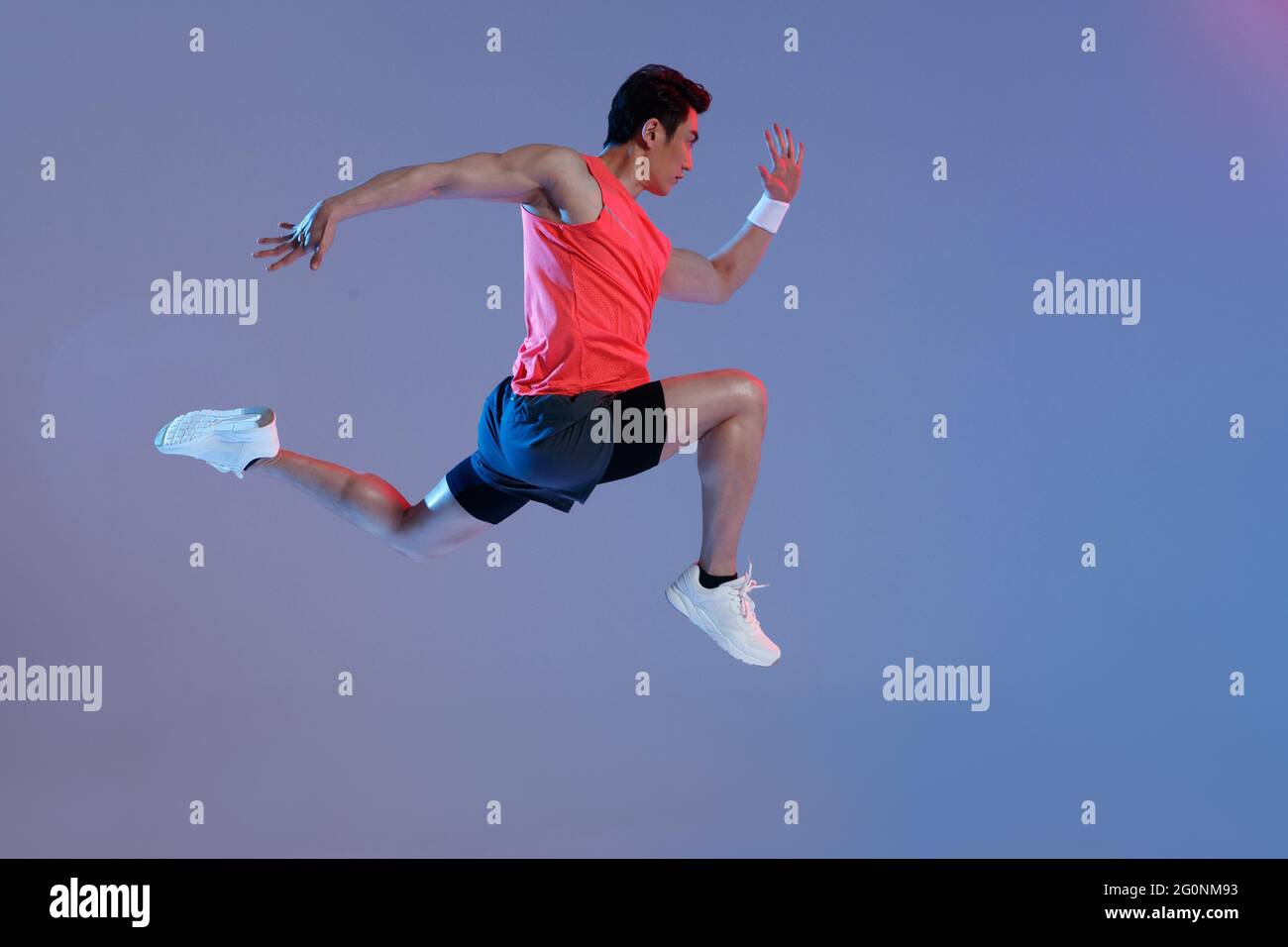 Running jump athletes Stock Photo - Alamy