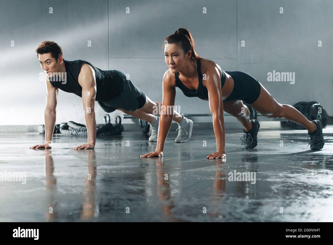 Young people in the gym to work out Stock Photo - Alamy