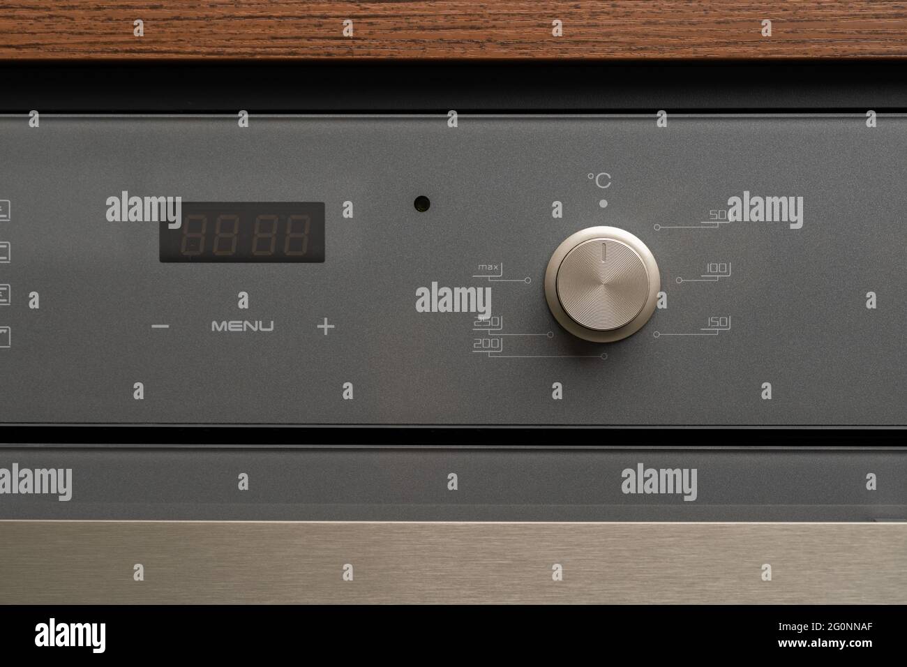 Modern oven mode control button close up Stock Photo - Alamy