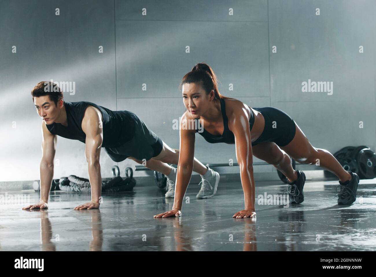 Young people in the gym to work out Stock Photo - Alamy