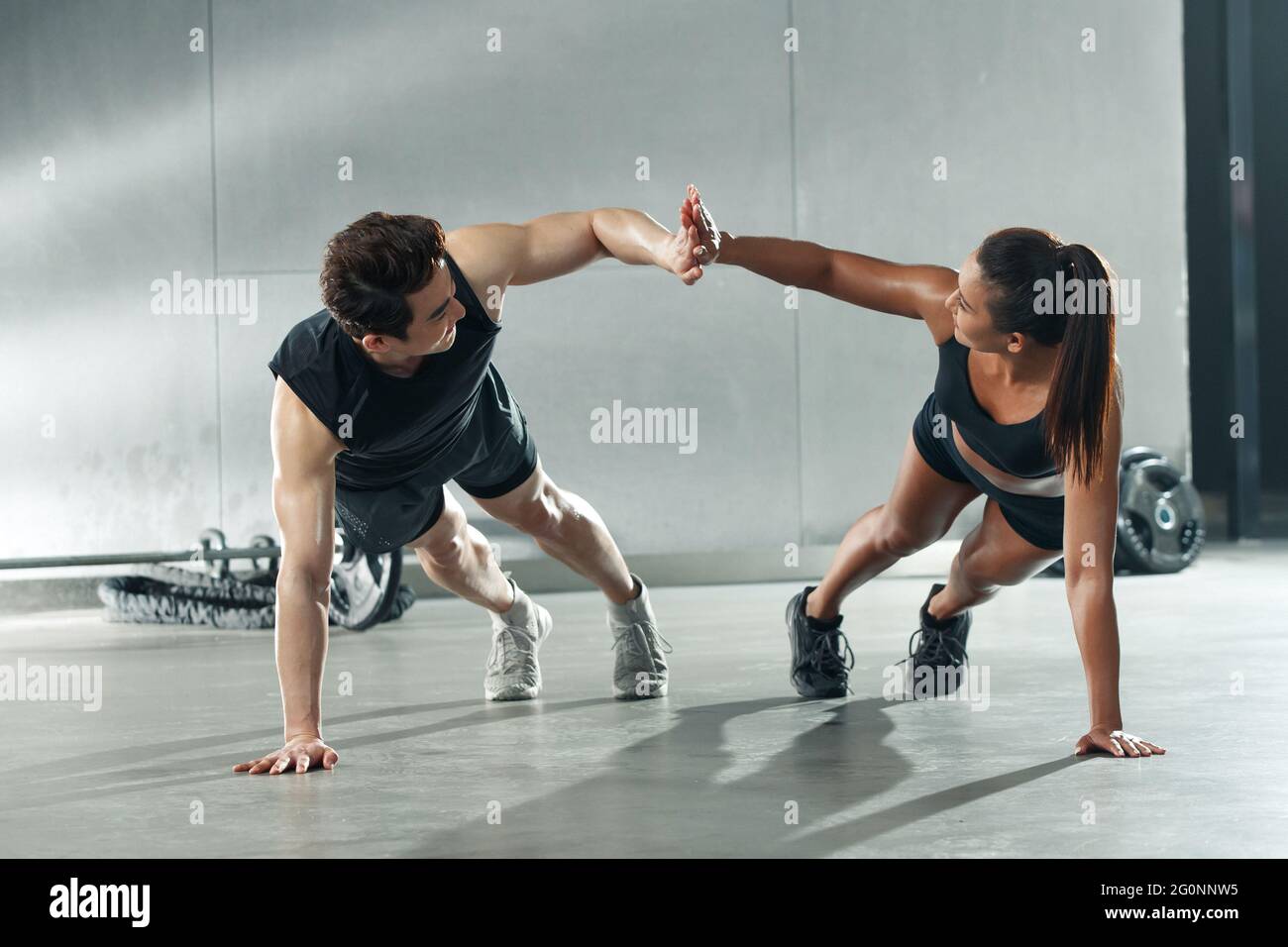 Young people in the gym to work out Stock Photo - Alamy