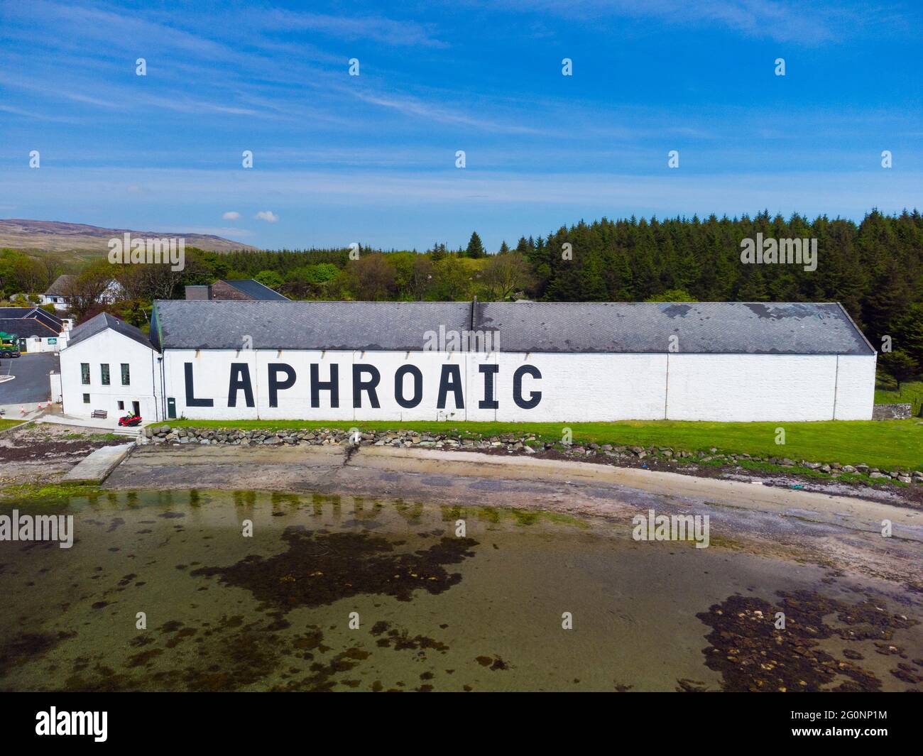 Aerial view from drone of Laphroaig scotch whisky distillery at ...