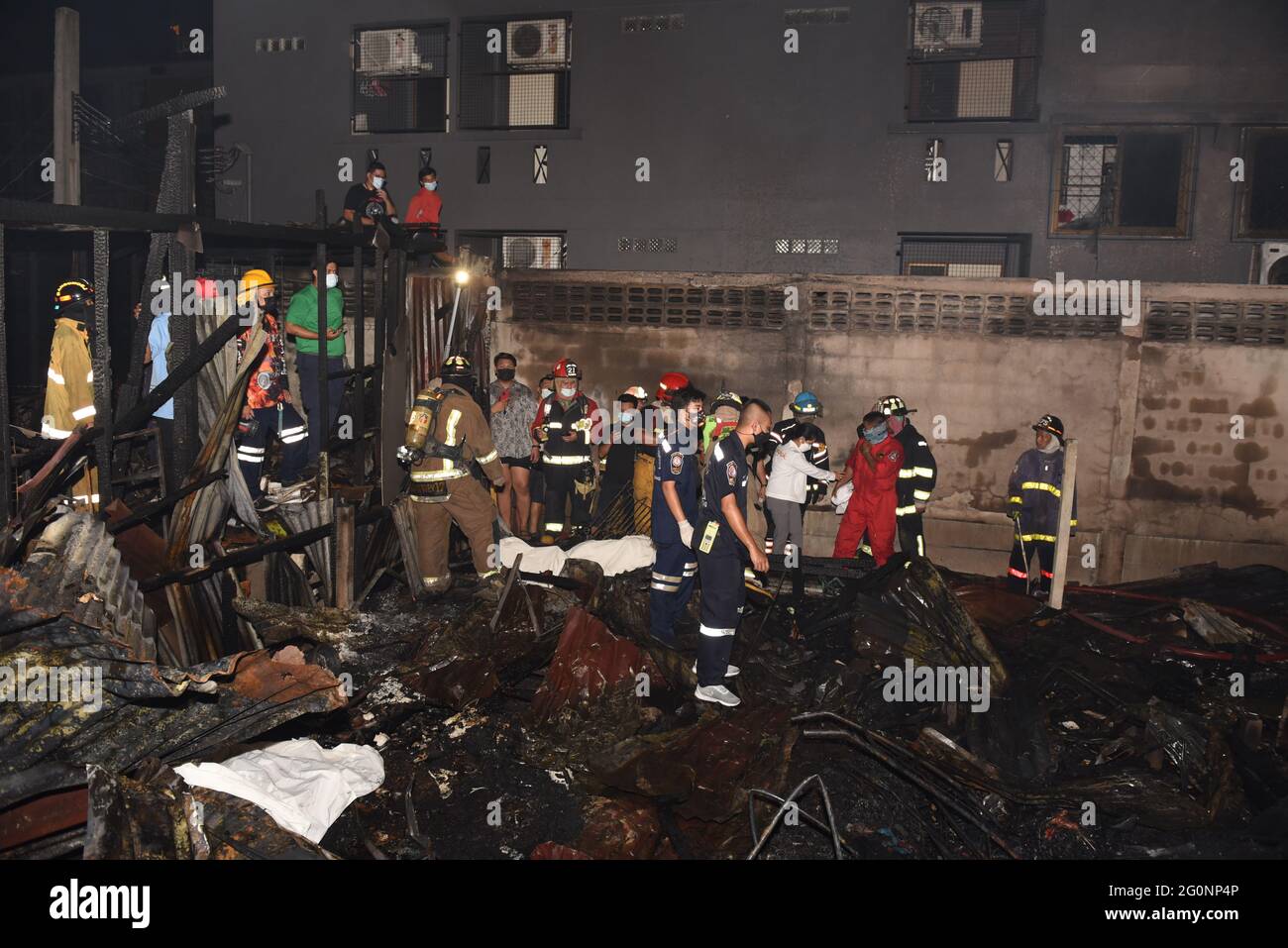 Bangkok, Thailand. 02nd June, 2021. Thailand - Rescuers use white cloth ...