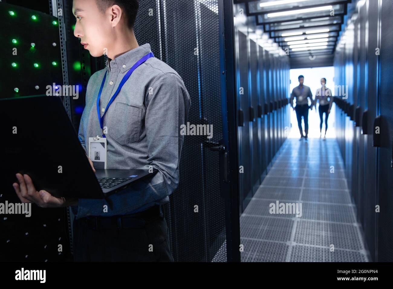 Technical personnel in machine room inspection Stock Photo - Alamy