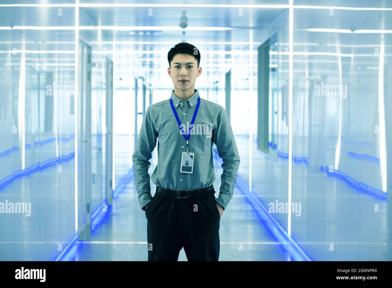 The young technical staff stood in the corridor Stock Photo - Alamy