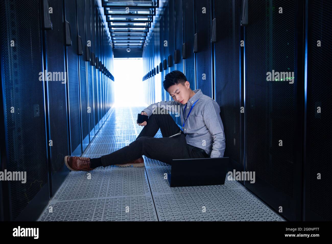 Technicians check the maintenance in the computer room Stock Photo - Alamy