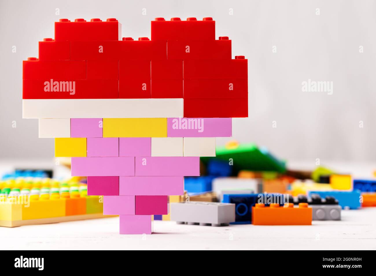 Heart shaped toy constructor details on white background Stock Photo ...