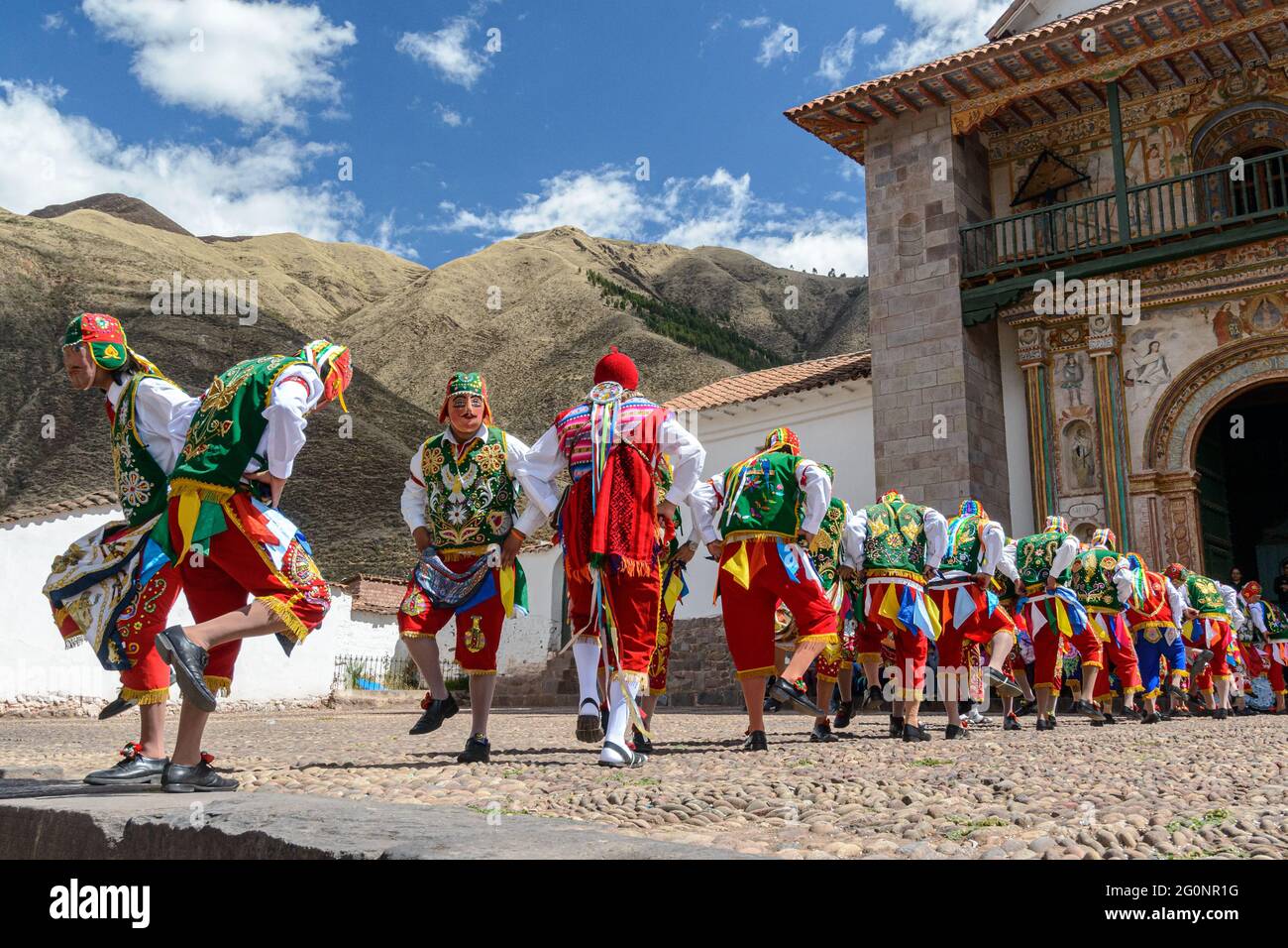 Peruvian folkloric dance, with colorful costumes in front of The Church ...