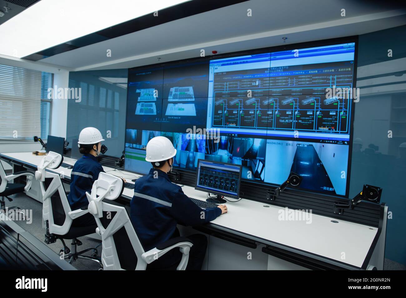 Technical personnel in the control room Stock Photo - Alamy