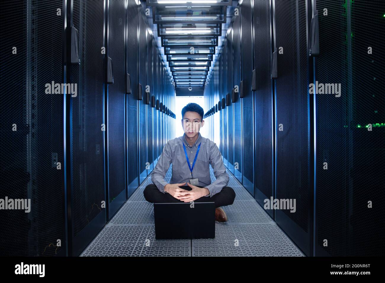 Technicians check the maintenance in the computer room Stock Photo - Alamy