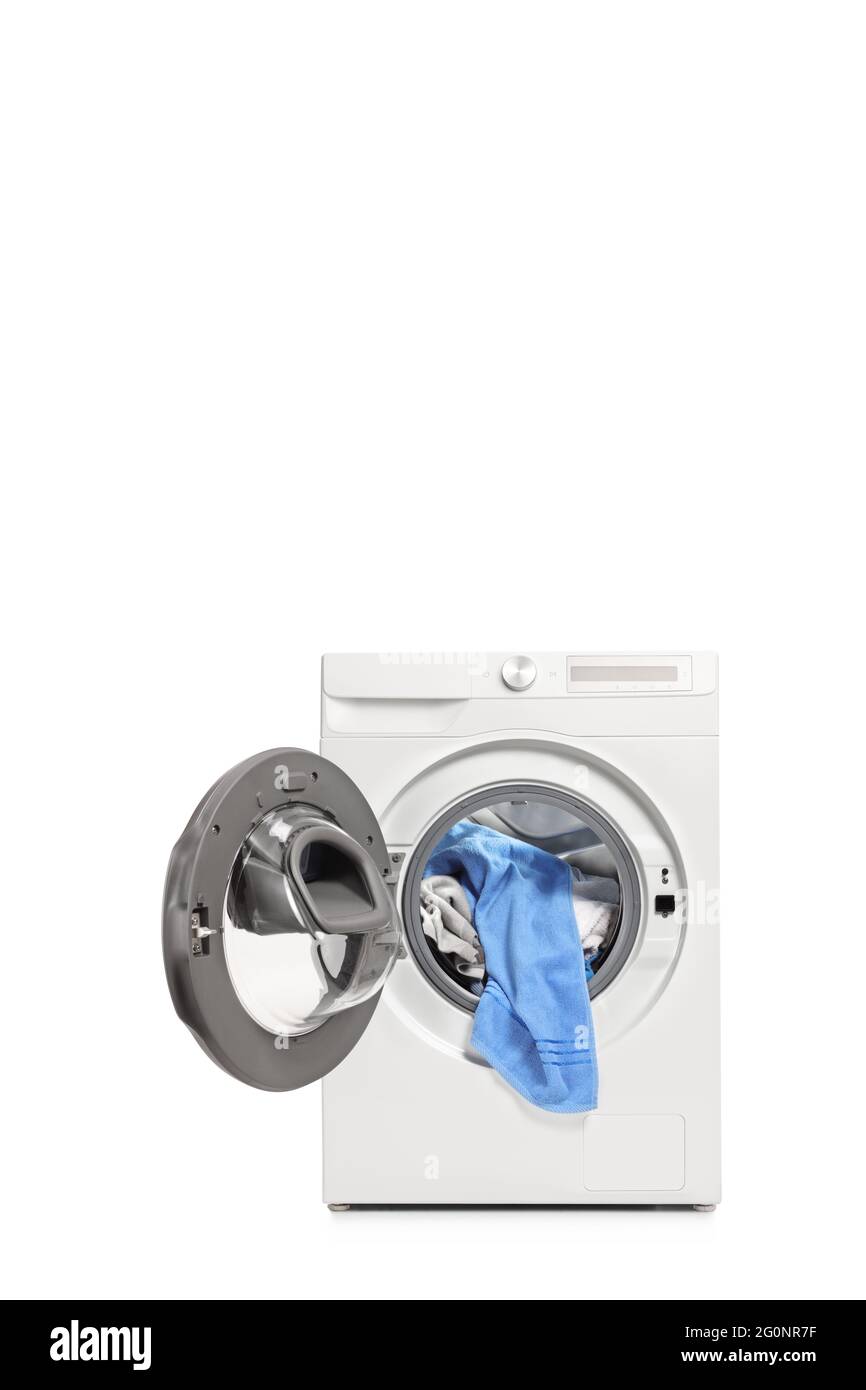 Studio shot of an open washing machine with clothes inside isolated on ...