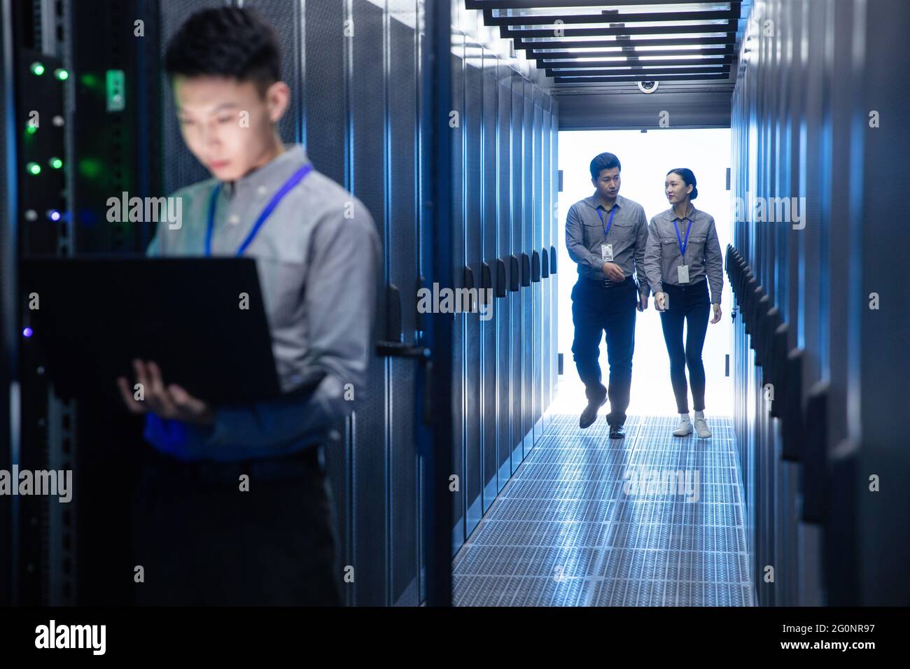 Technical personnel in machine room inspection Stock Photo - Alamy