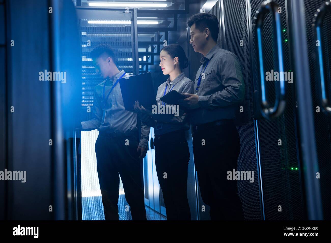 Technical personnel in machine room inspection Stock Photo - Alamy