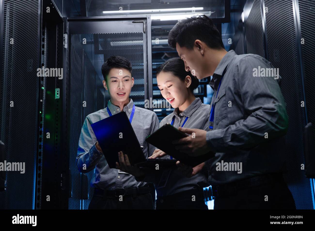 Technical personnel in machine room inspection Stock Photo - Alamy