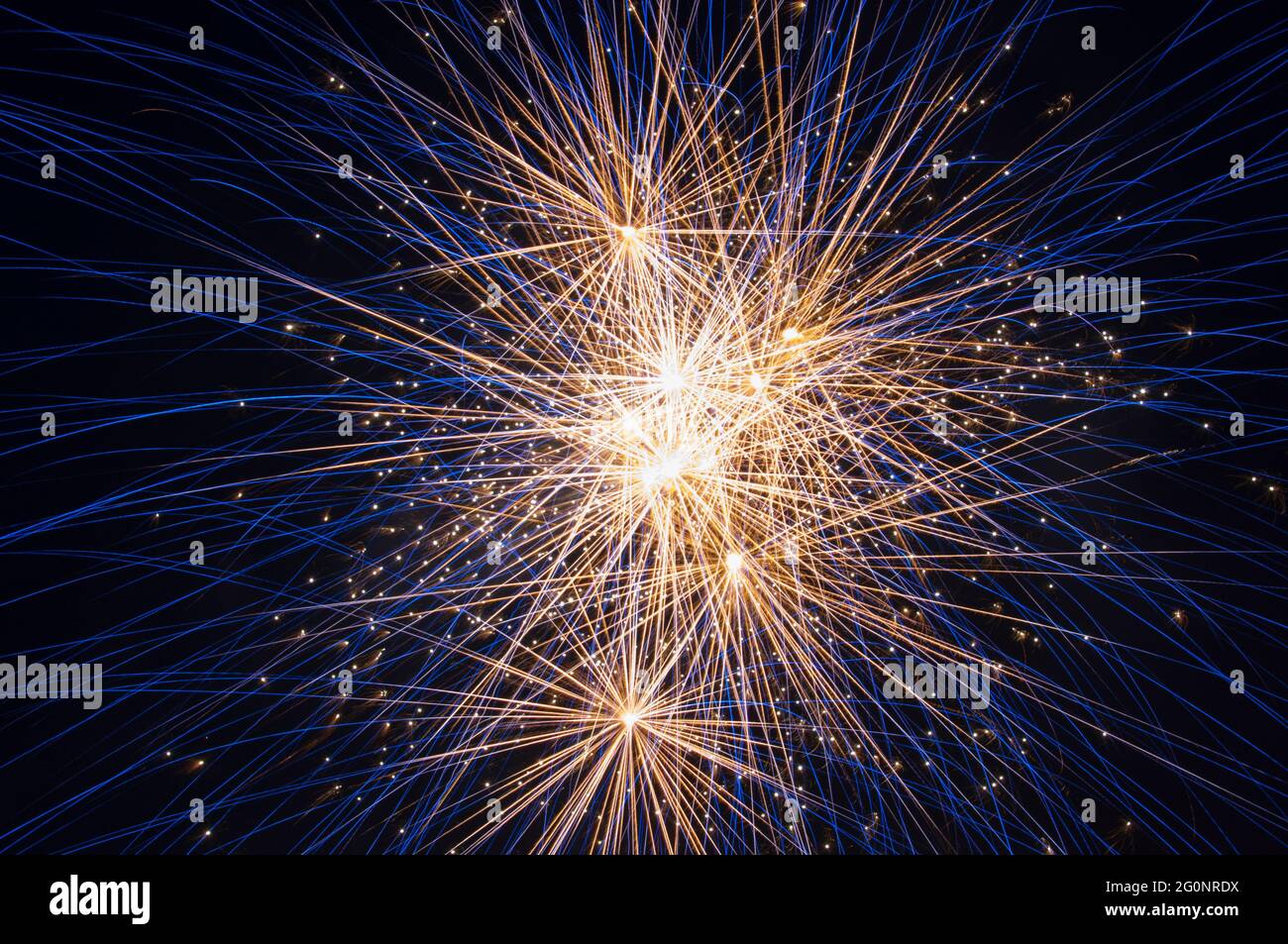 Abstract - Gold and blue firework Stock Photo - Alamy