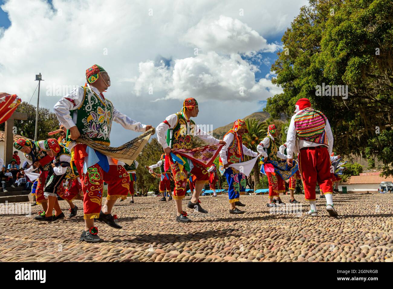 Peruvian folkloric dance, with colorful costumes in front of The Church ...