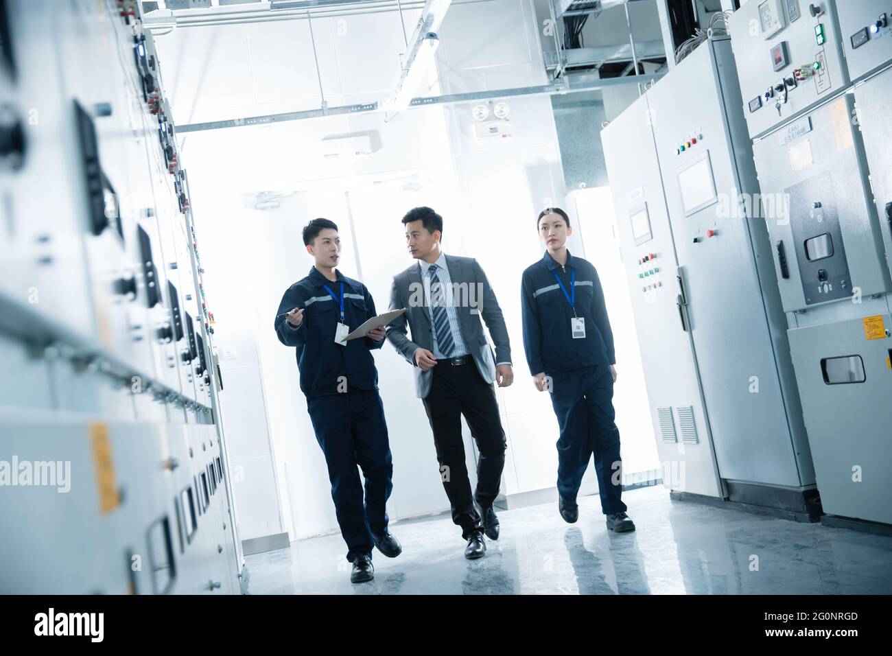 Technical personnel with leadership in the factory inspection Stock ...