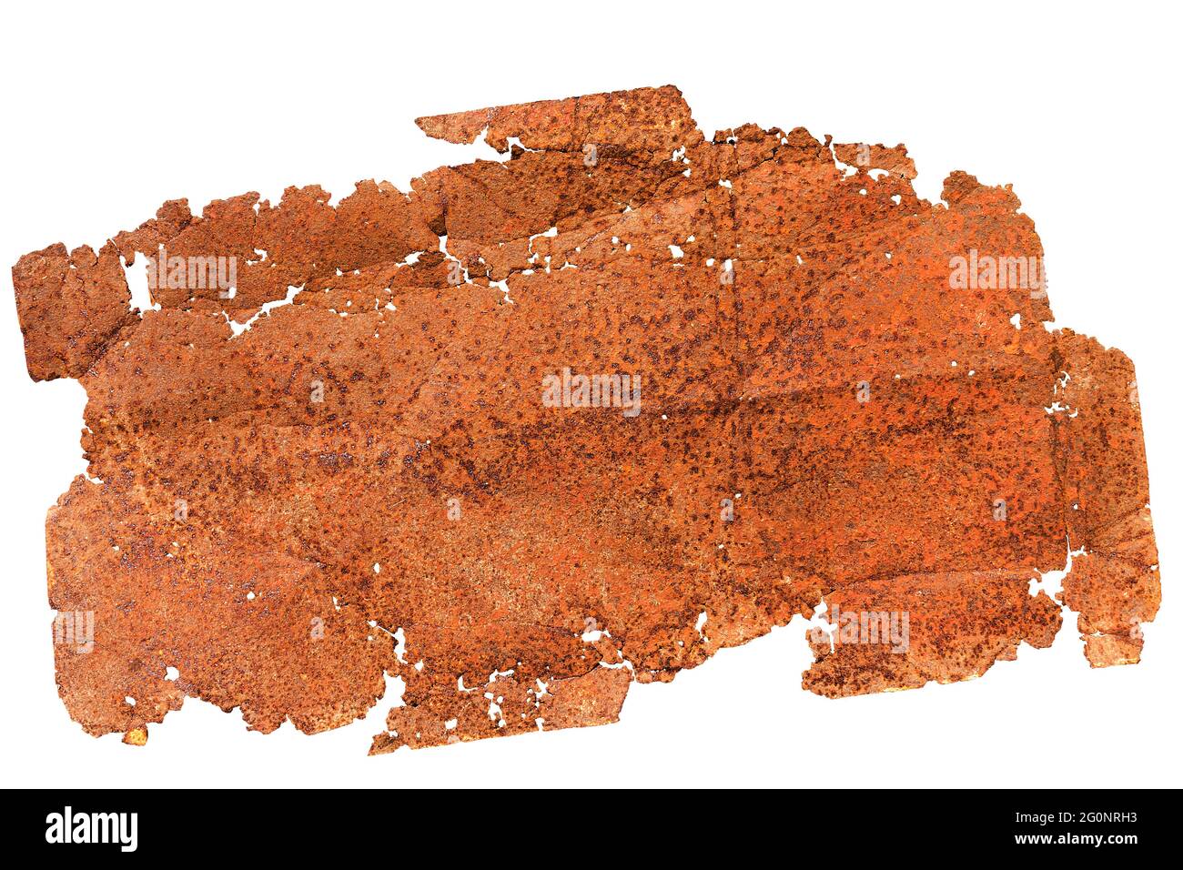 A very old piece of sheet metal, rusted through, with holes and ragged ...