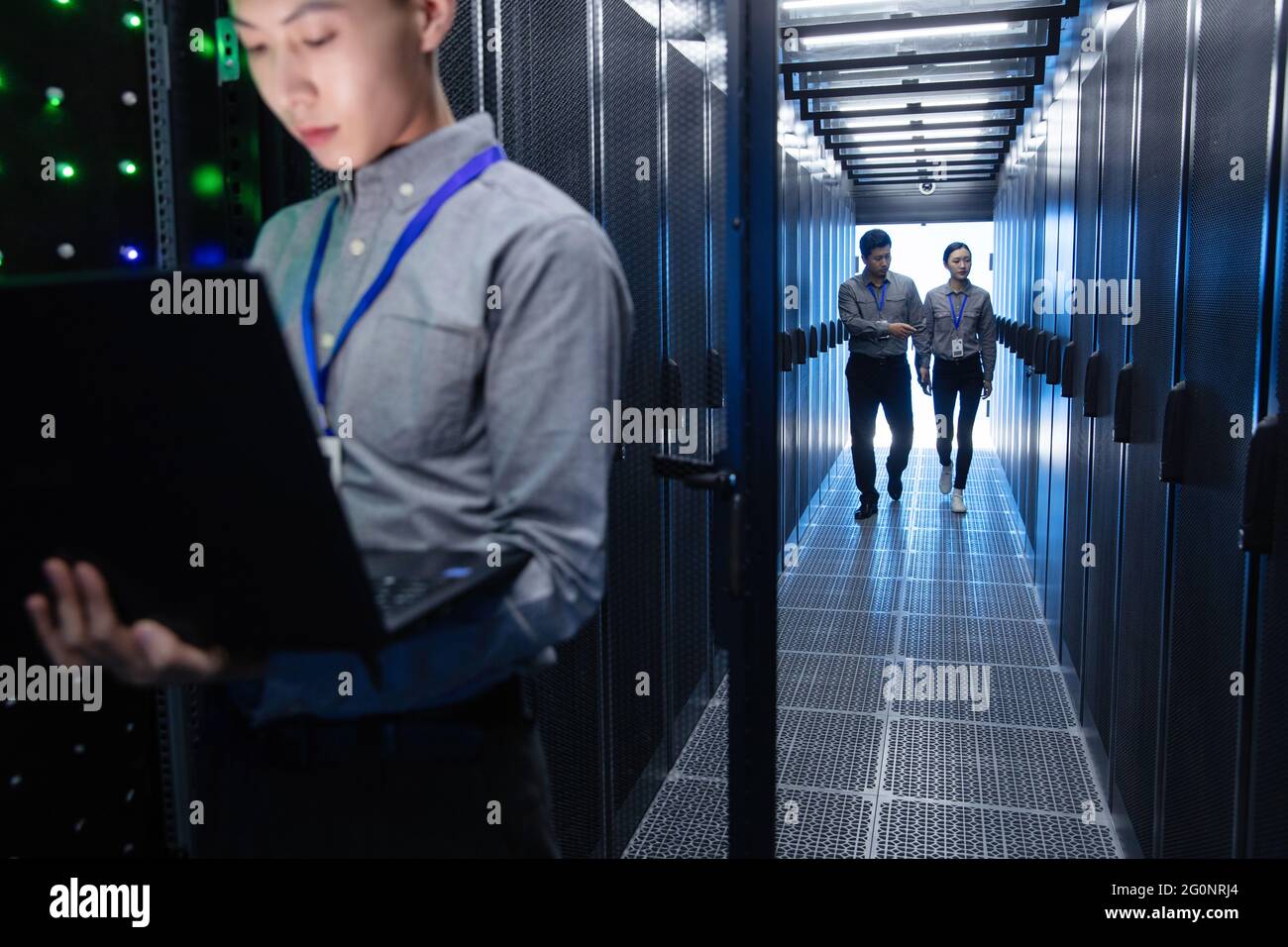 Technical personnel in machine room inspection Stock Photo - Alamy