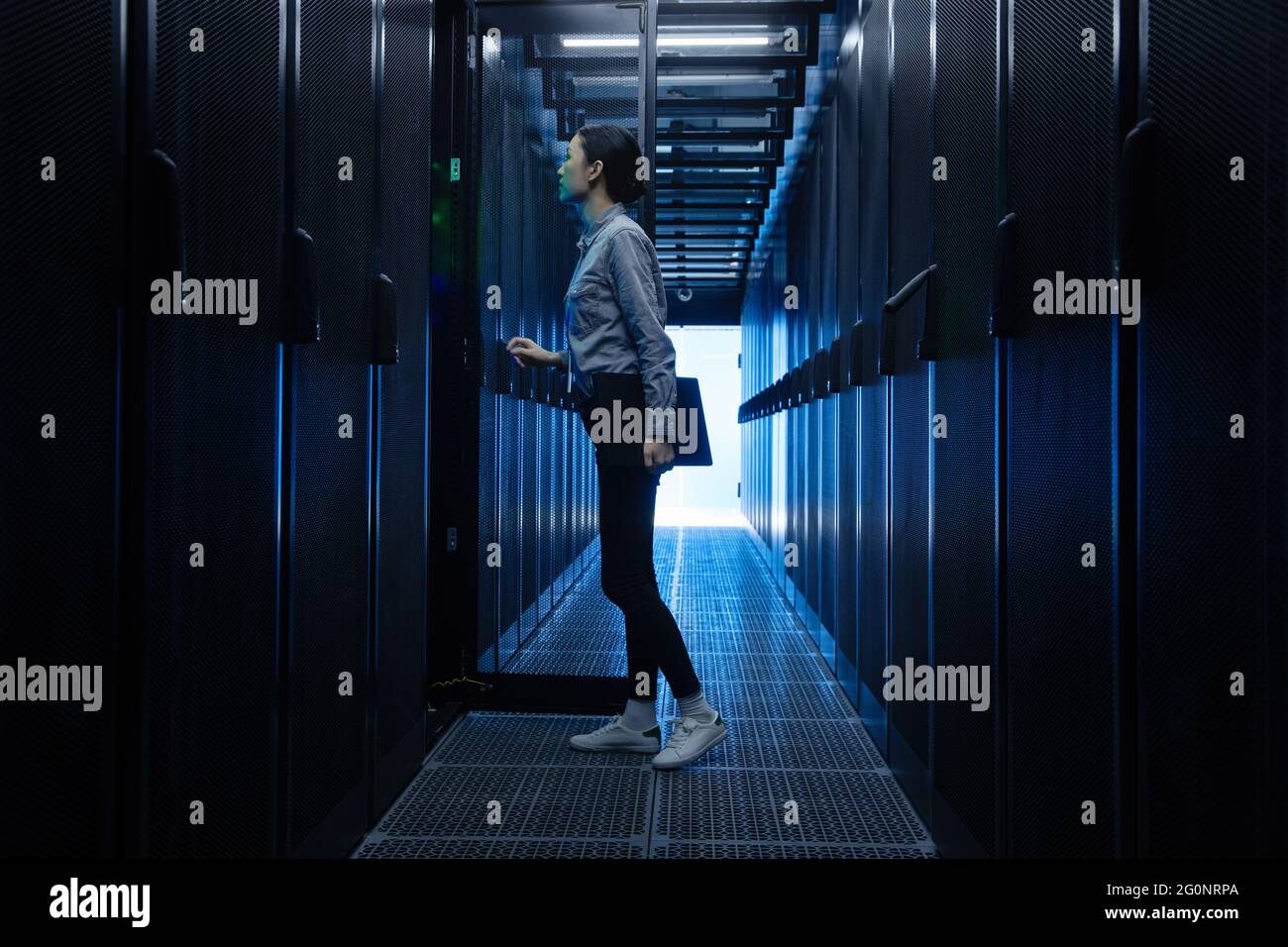 Technicians check the maintenance in the computer room Stock Photo - Alamy