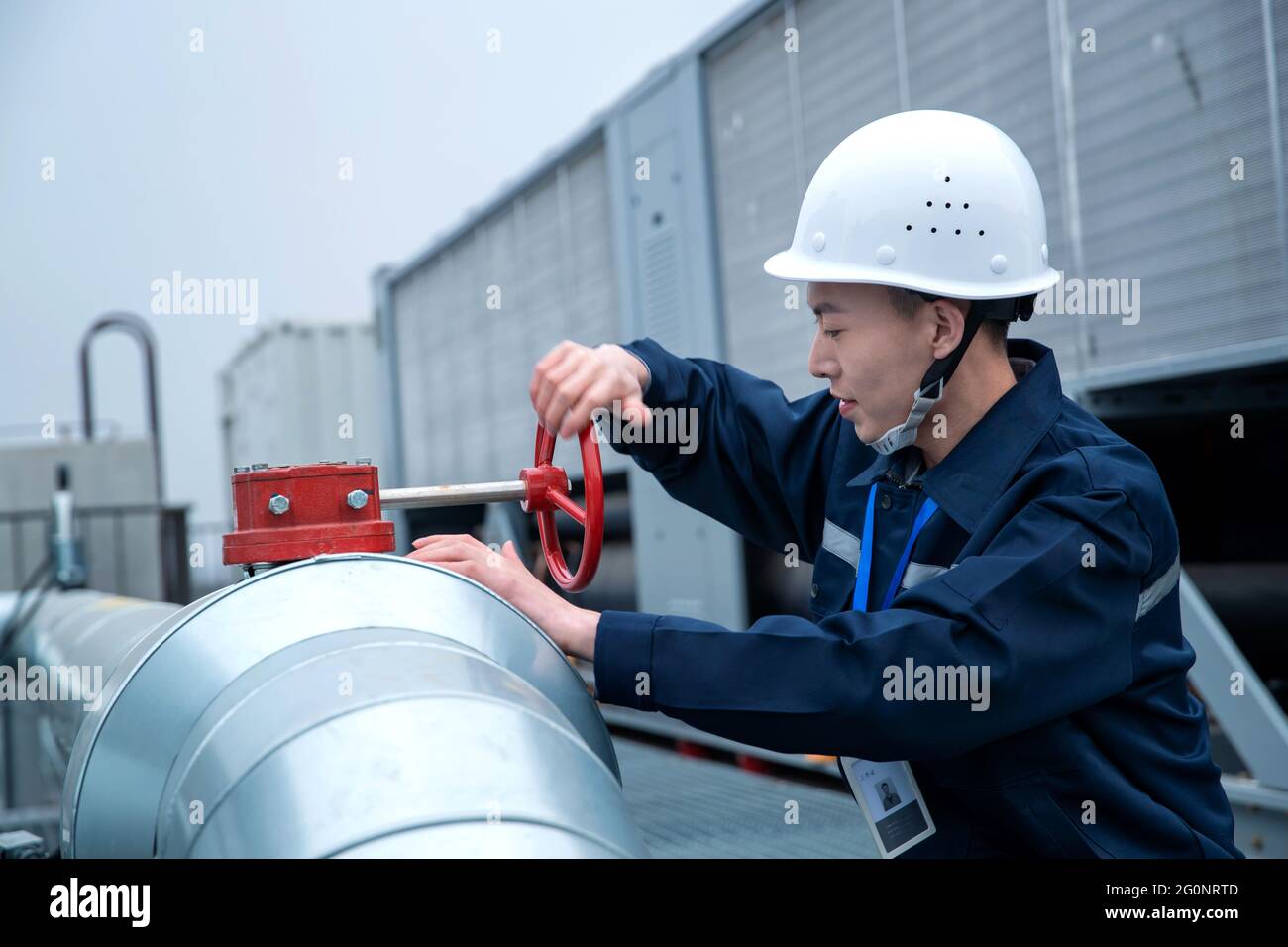Technical personnel in the factory inspection pipeline switch Stock ...