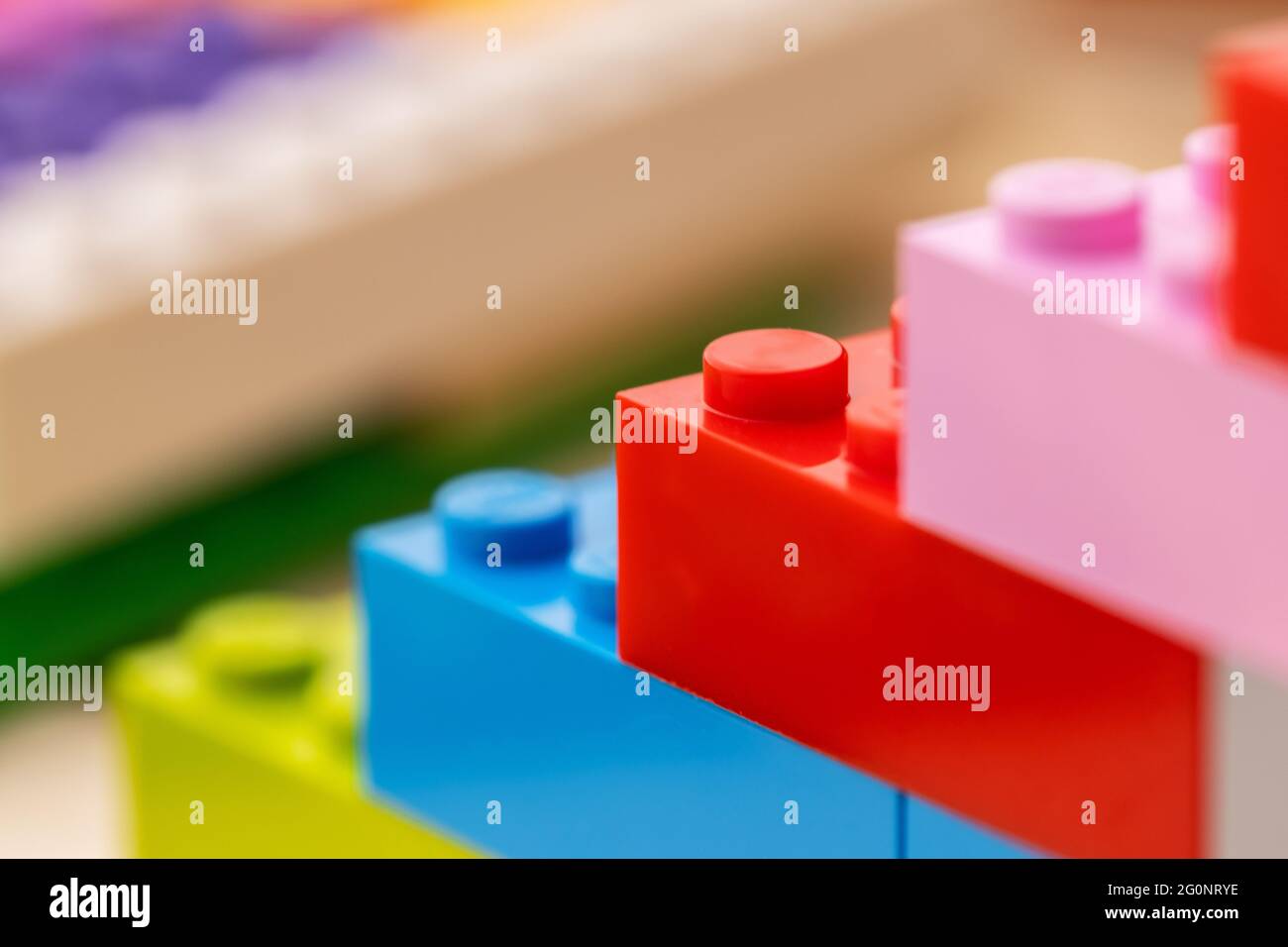Details of children's plastic building kit close up Stock Photo - Alamy