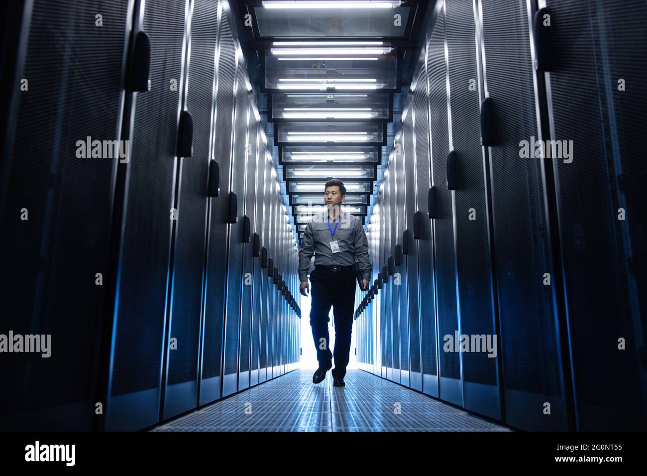 Technicians check the maintenance in the computer room Stock Photo - Alamy