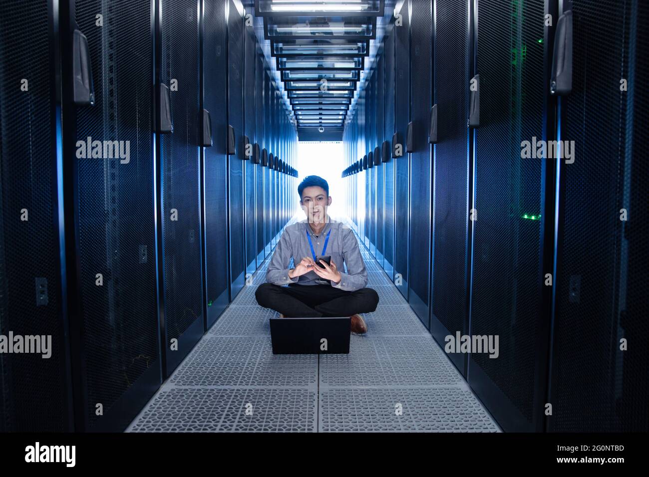 Technicians check the maintenance in the computer room Stock Photo - Alamy