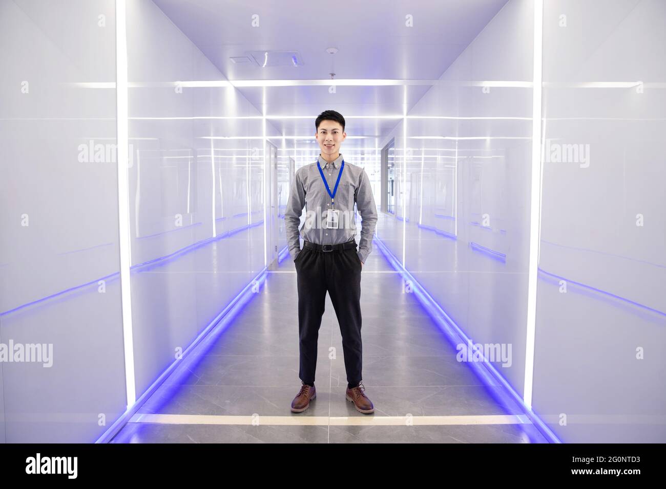 The young technical staff stood in the corridor Stock Photo - Alamy