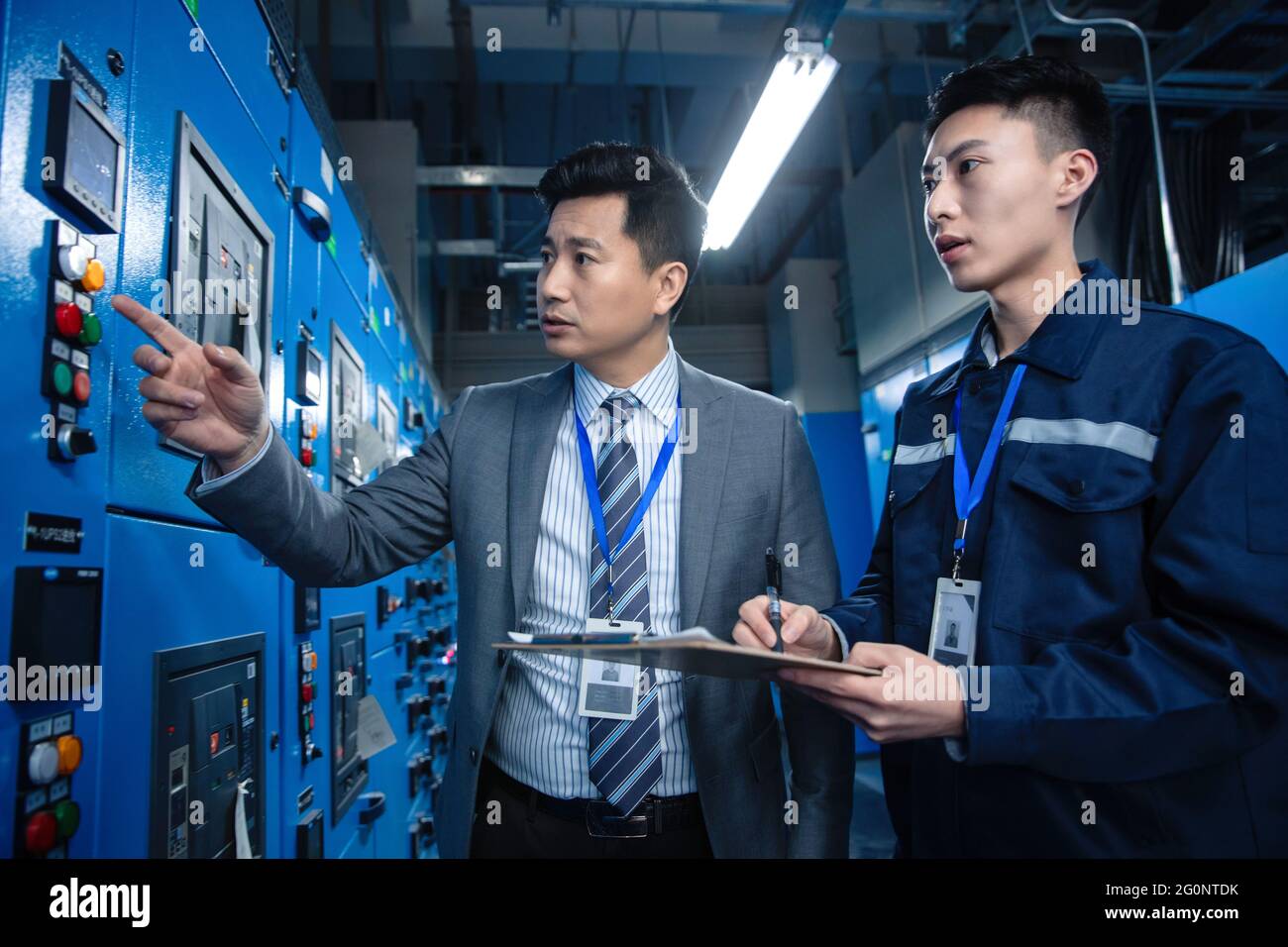 Technical personnel with leadership in the factory inspection Stock ...