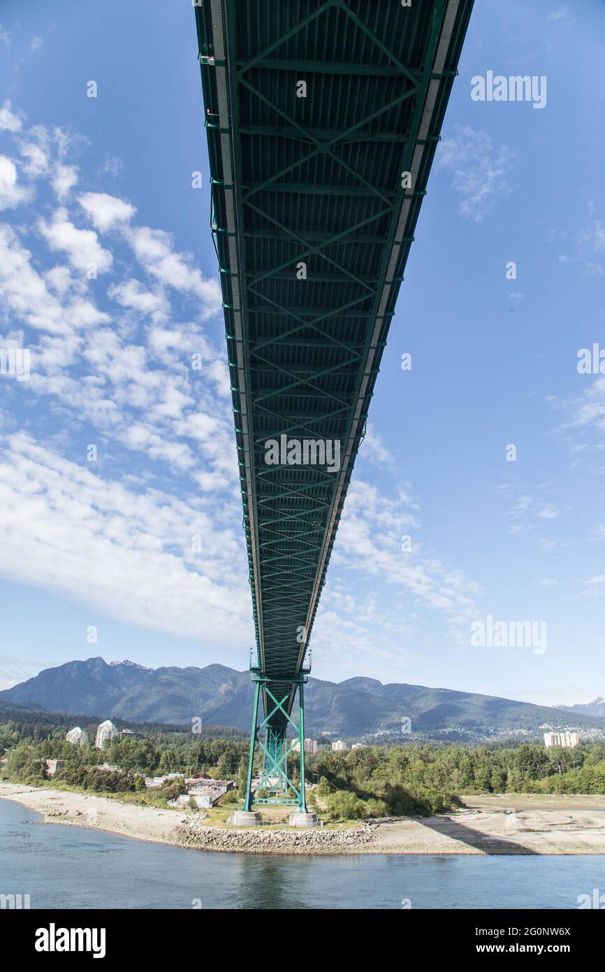 Underneath a Steel Truss Bridge With a Majestic Mountain Landscape ...