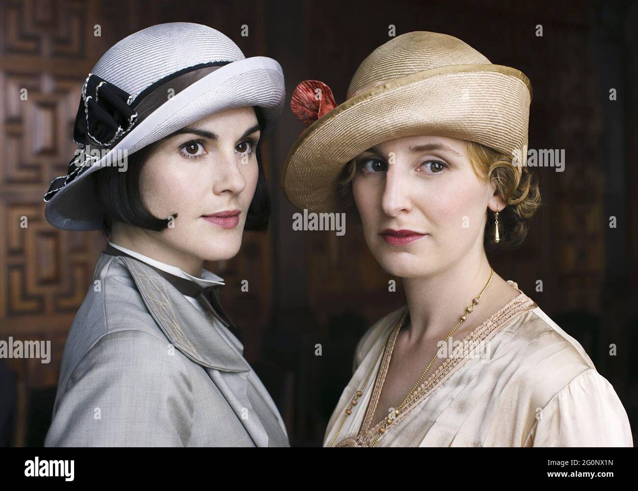 UK. Michelle Dockery and Laura Carmichael in © ITV-Carnival Films TV series : Downton Abbey ...