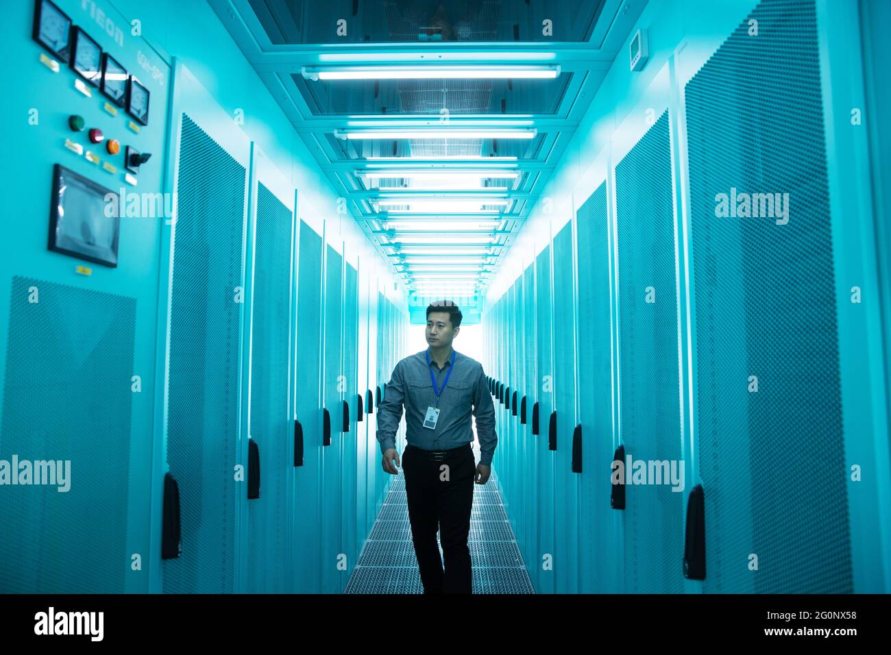 Technicians check the maintenance in the computer room Stock Photo - Alamy