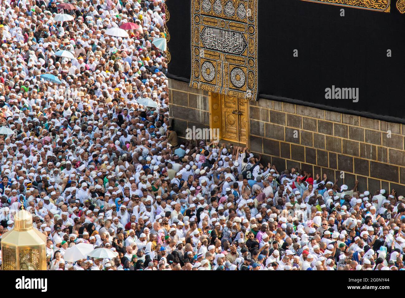 Holy Kaaba in Mecca city. Door of Kaaba - Multazam. Crowd of muslim ...