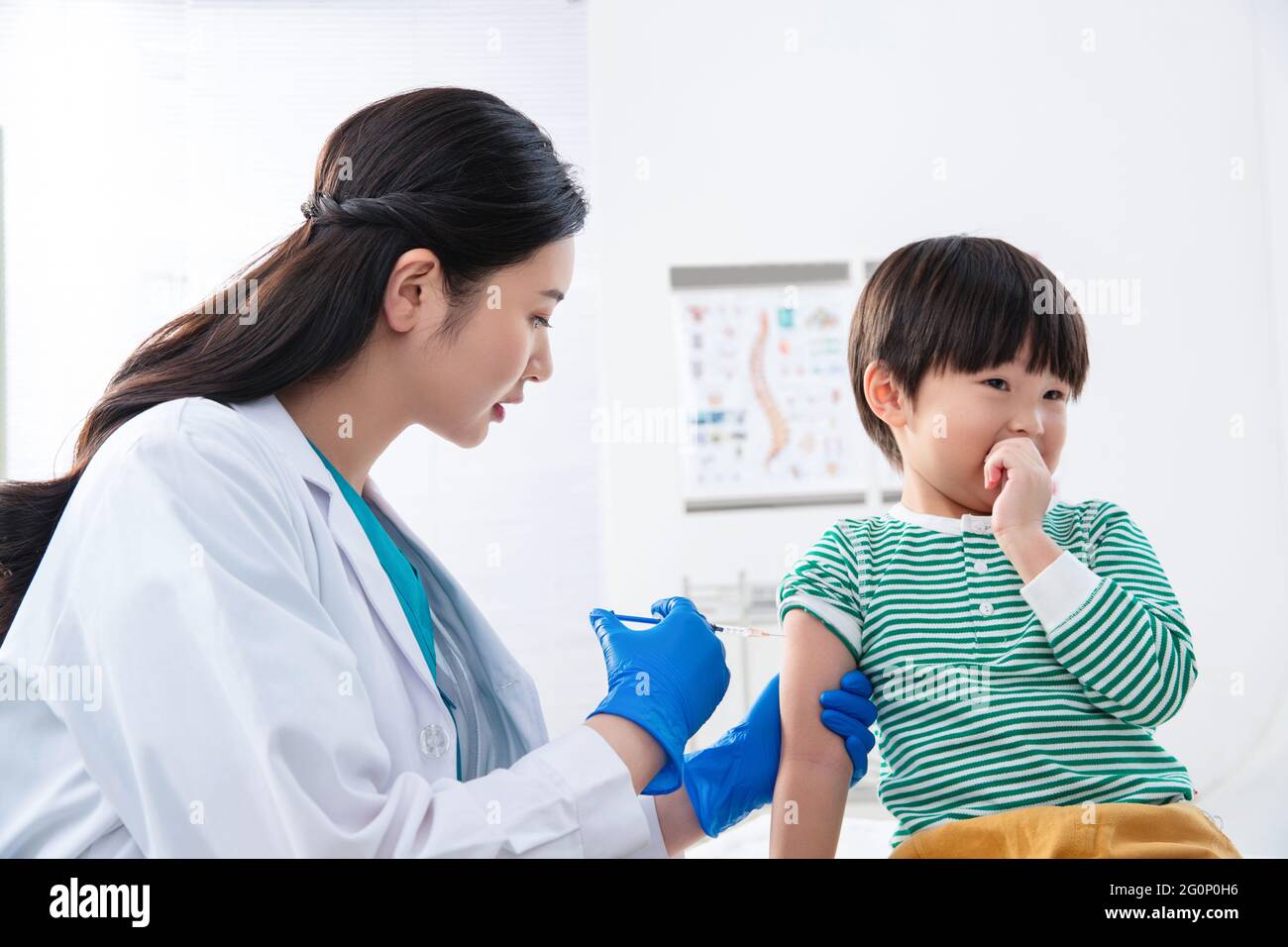 China doctor boy injection hi-res stock photography and images - Alamy