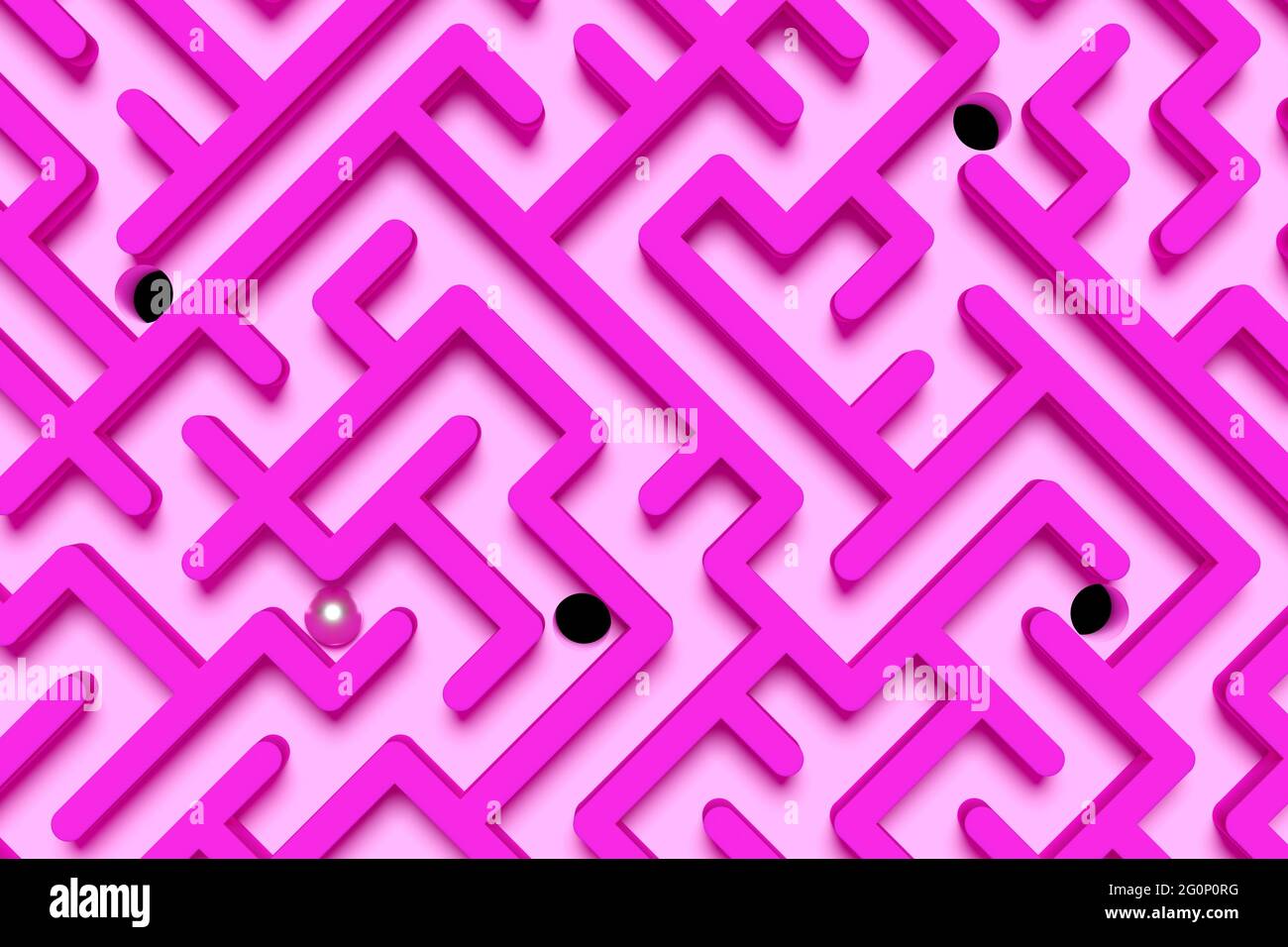 Large pink maze or labyrinth with chrome ball and holes over pink ...