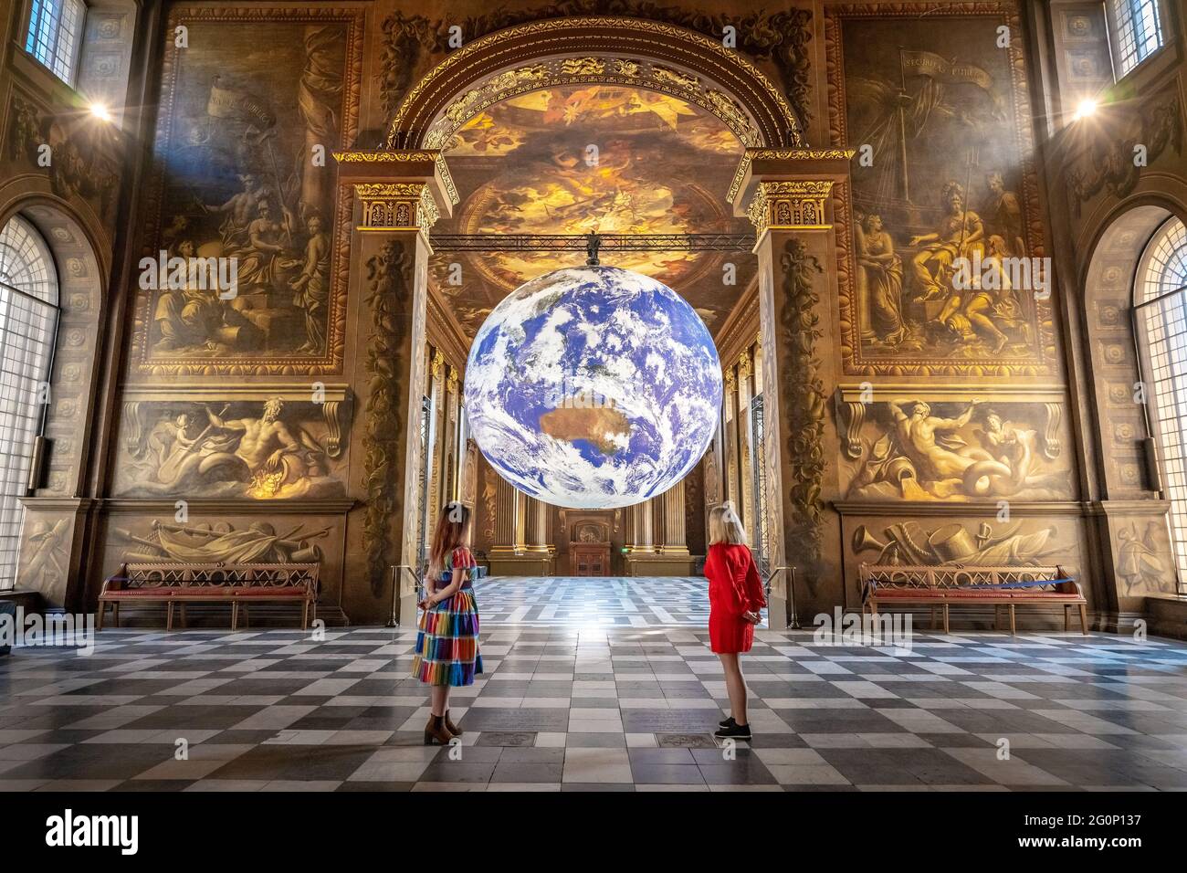 Gaia, a 7m-wide rotating replica earth installation by Luke Jerram on ...