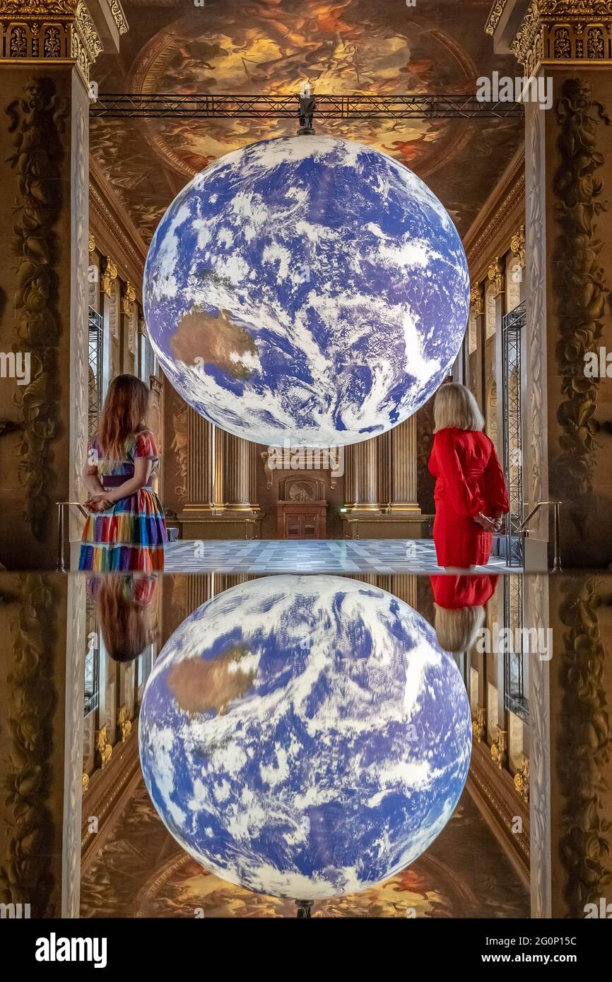 Gaia, a 7m-wide rotating replica earth installation by Luke Jerram on ...