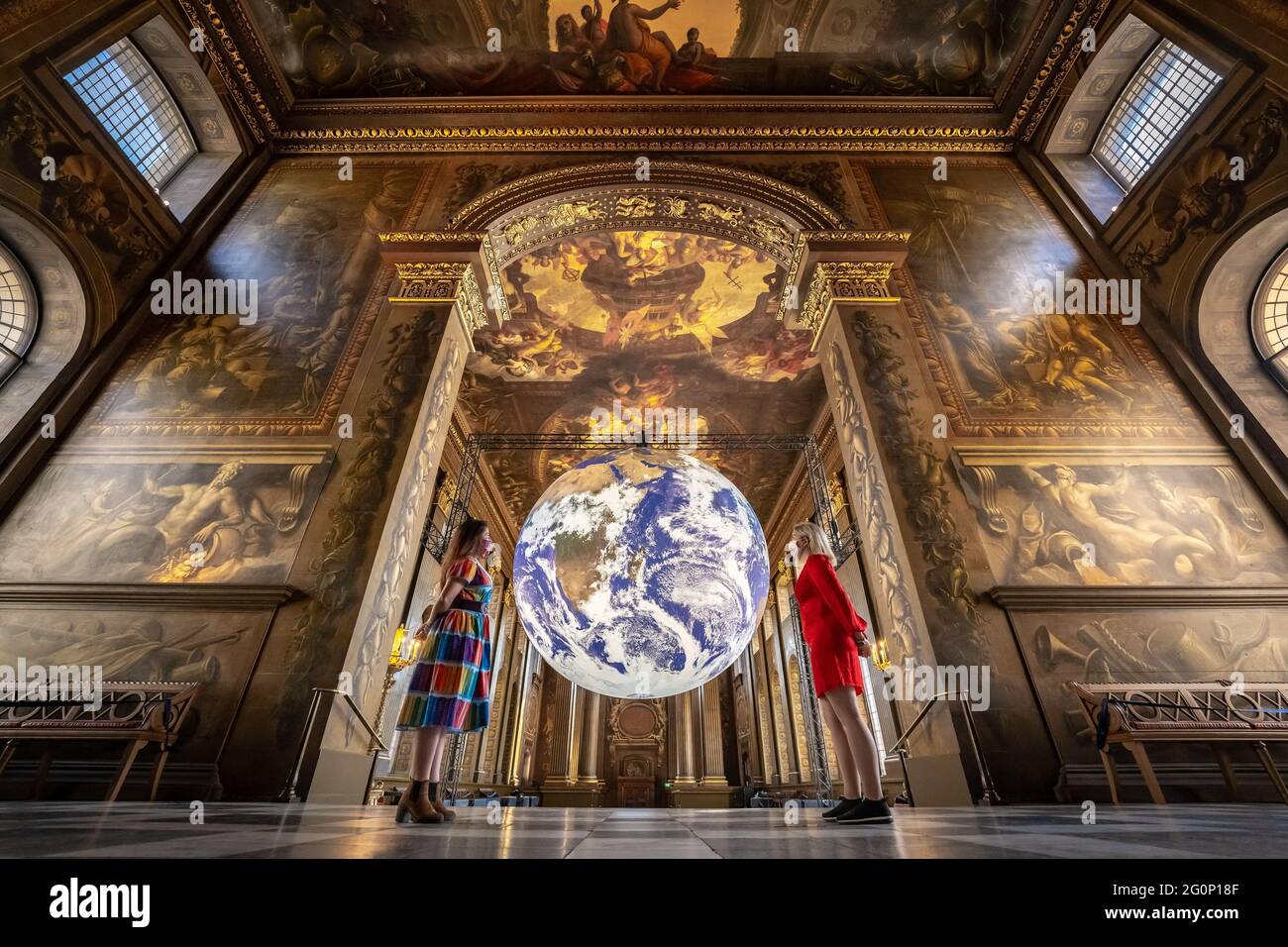 Gaia, a 7m-wide rotating replica earth installation by Luke Jerram on ...