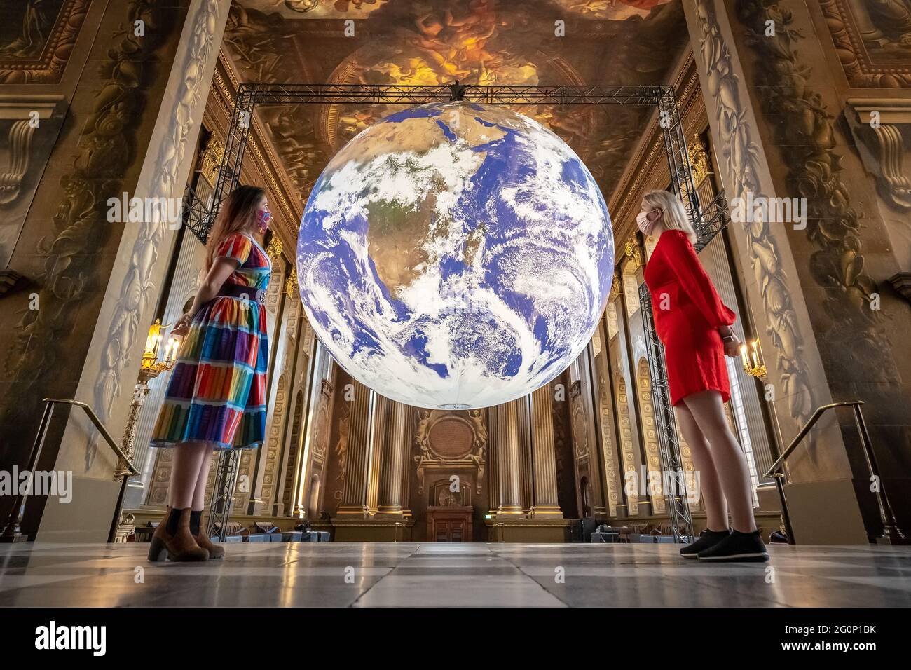 Gaia, a 7m-wide rotating replica earth installation by Luke Jerram on ...